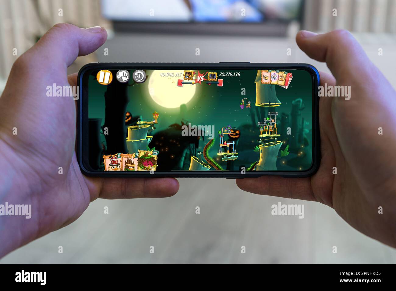 Playing Angry Birds mobile game. Point of view angry birds on ... Playing Angry Birds mobile game. Point of view angry birds on ...