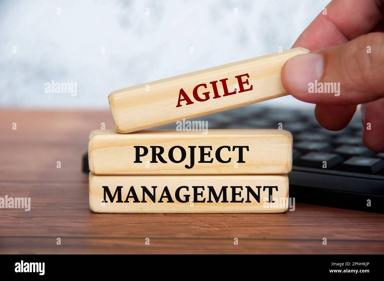 Agile project management text on wooden blocks with keyboard and wooden ...