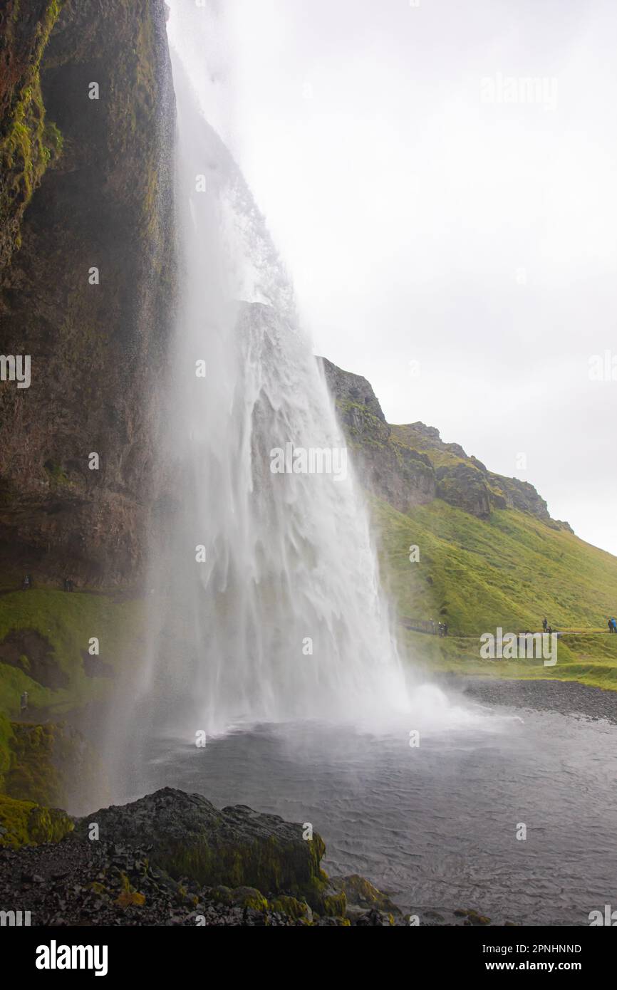 Seljalandsfoss waterfall in Iceland spraying and steaming while ...