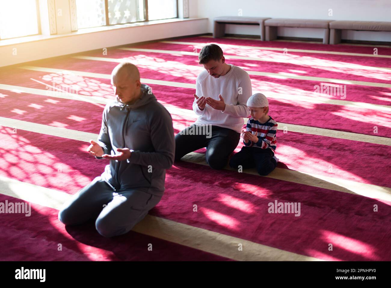 Indonesian muslim family learning together hi-res stock photography and ...