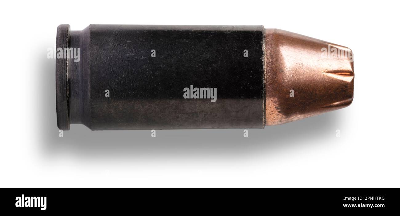 Horizontal hollow point bullet on 9 mm ammunition with a black case and ...
