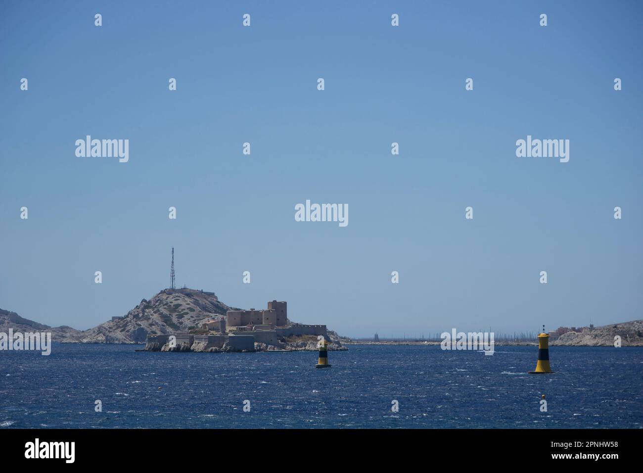 A breathtaking view of a tranquil ocean, with the If Castle in the ...