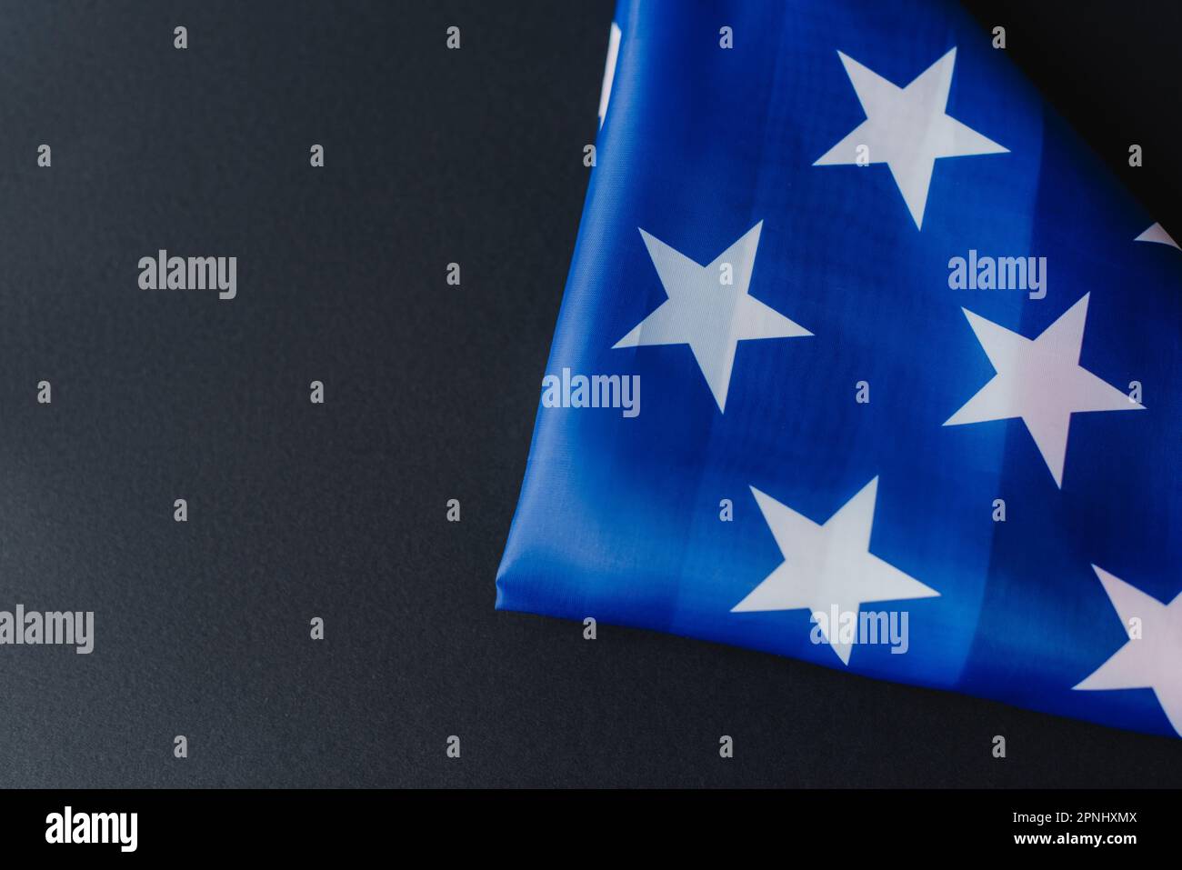 top view of folded flag of United States in triangle shape during ...