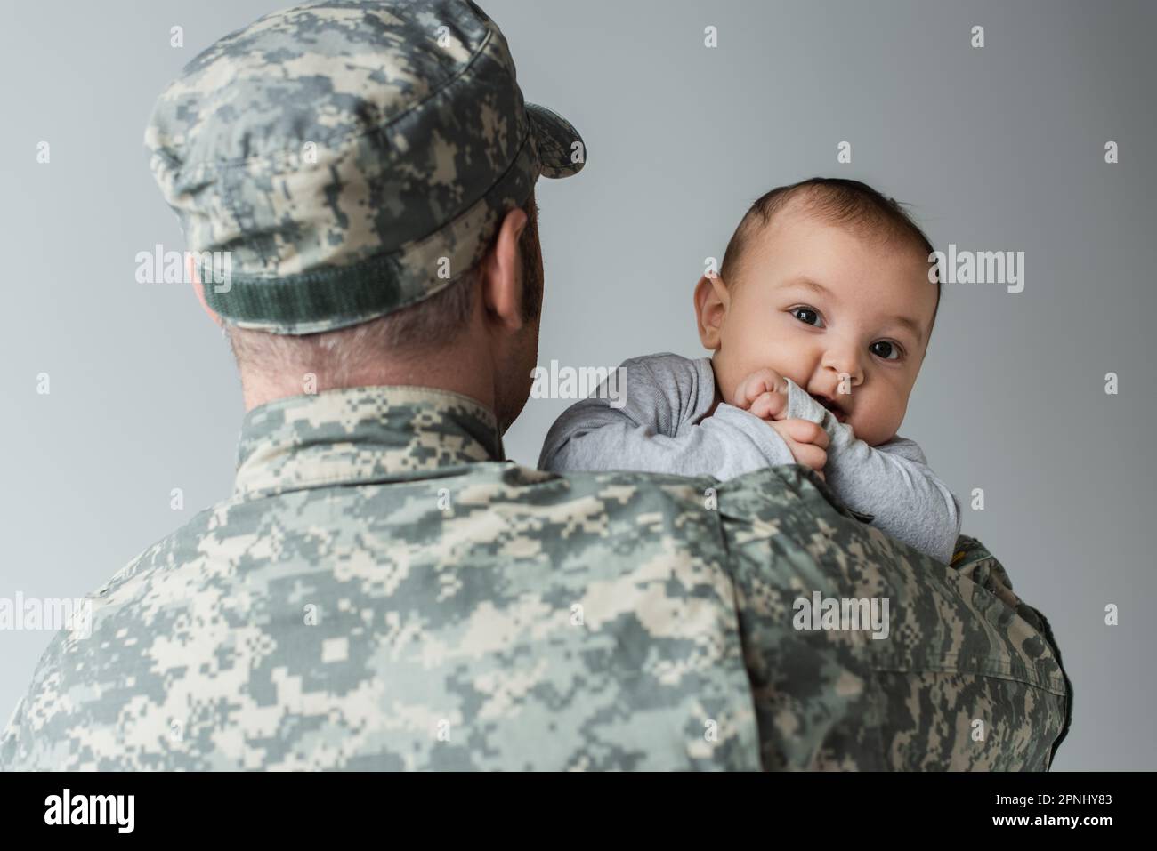 Baby in military uniform hi-res stock photography and images - Alamy