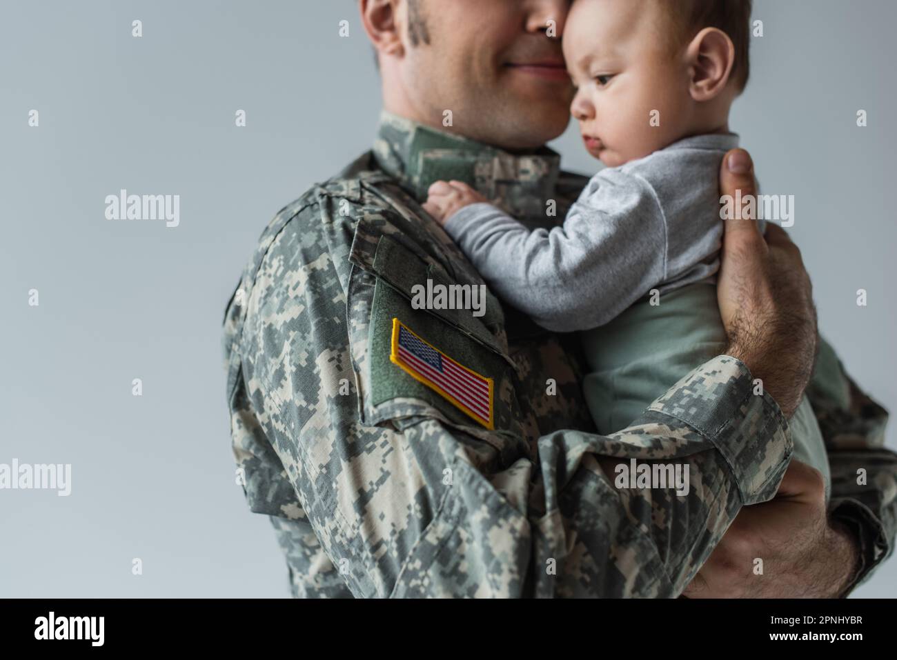 Baby and military father isolated hi-res stock photography and images ...