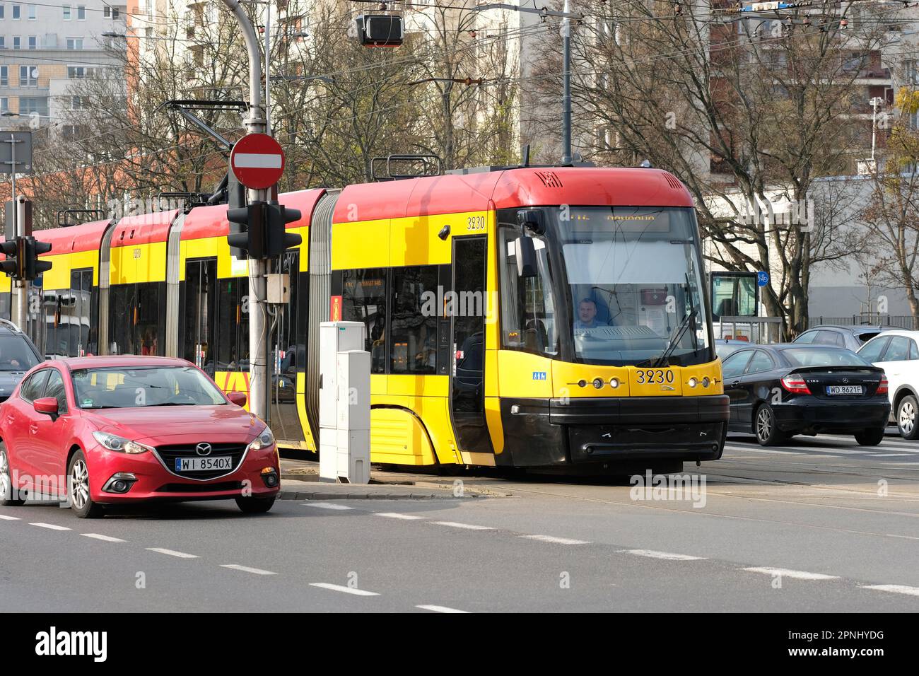Warsaw Poland public transport trams and car traffic near the city ...