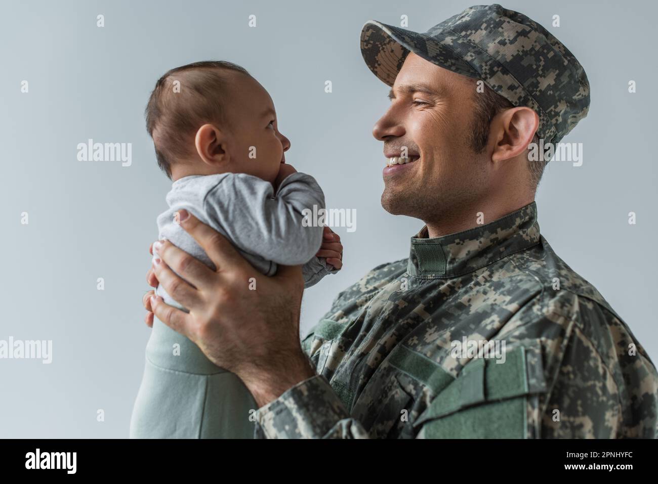 Baby and military father isolated hi-res stock photography and images ...