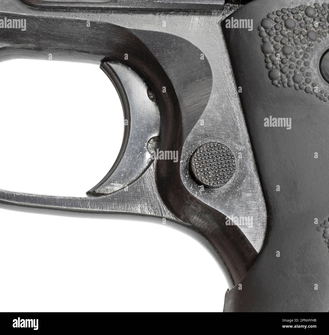 Magazine release and triggerr on a semi-automatic pistol isolated in a ...