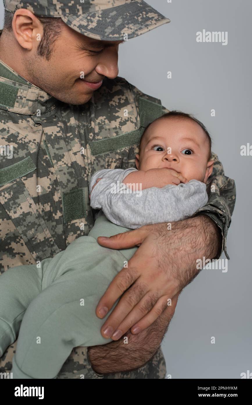 Baby and military father isolated hi-res stock photography and images ...