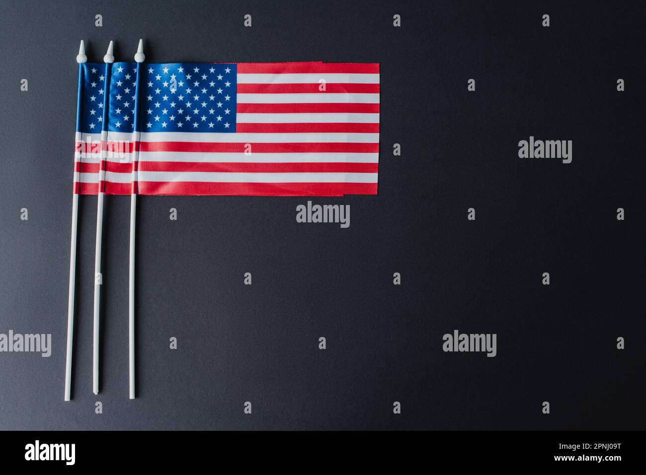 flat lay of American flags with stars and stripes for memorial day ...