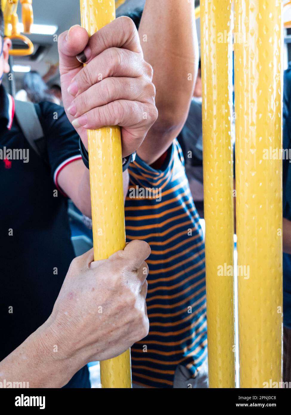 Public transport hands safety hi-res stock photography and images - Alamy