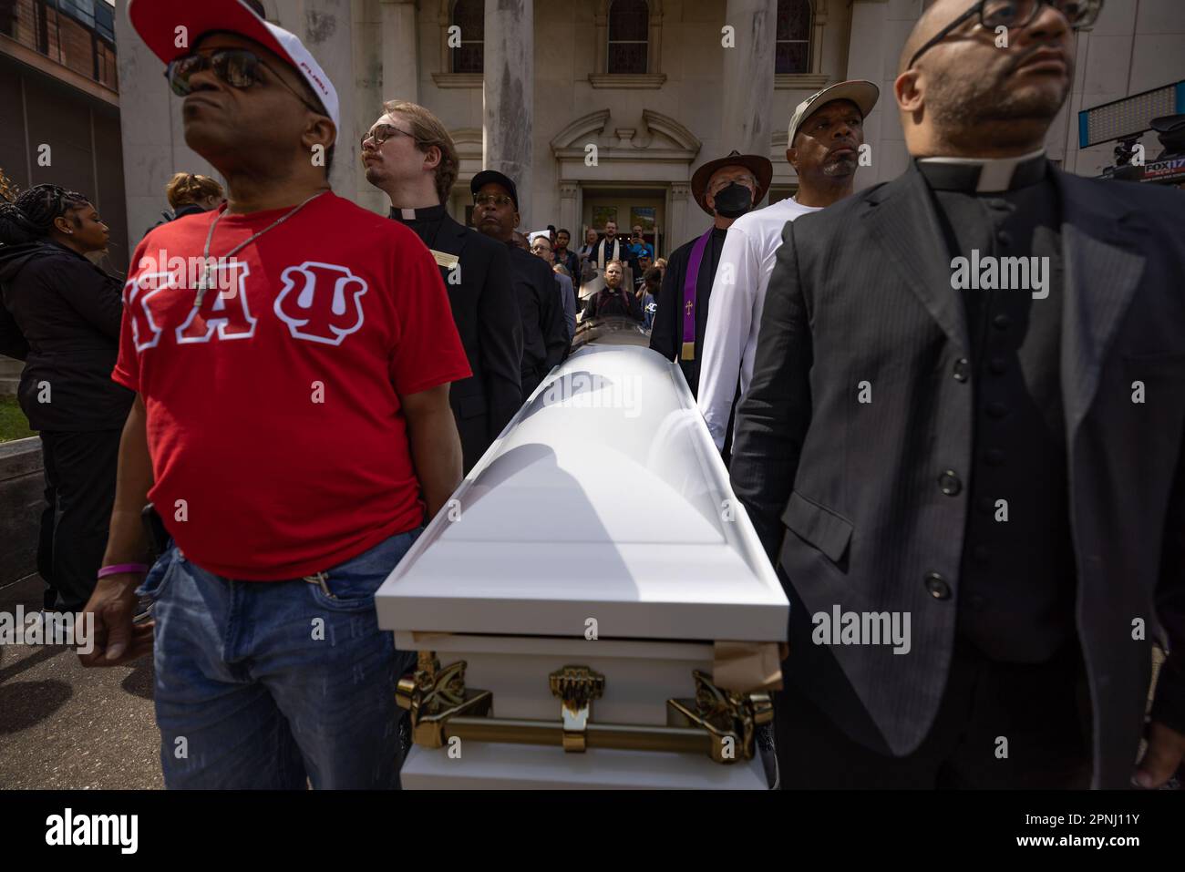 Gun safety advocates and faith leaders carry empty caskets symbolizing ...