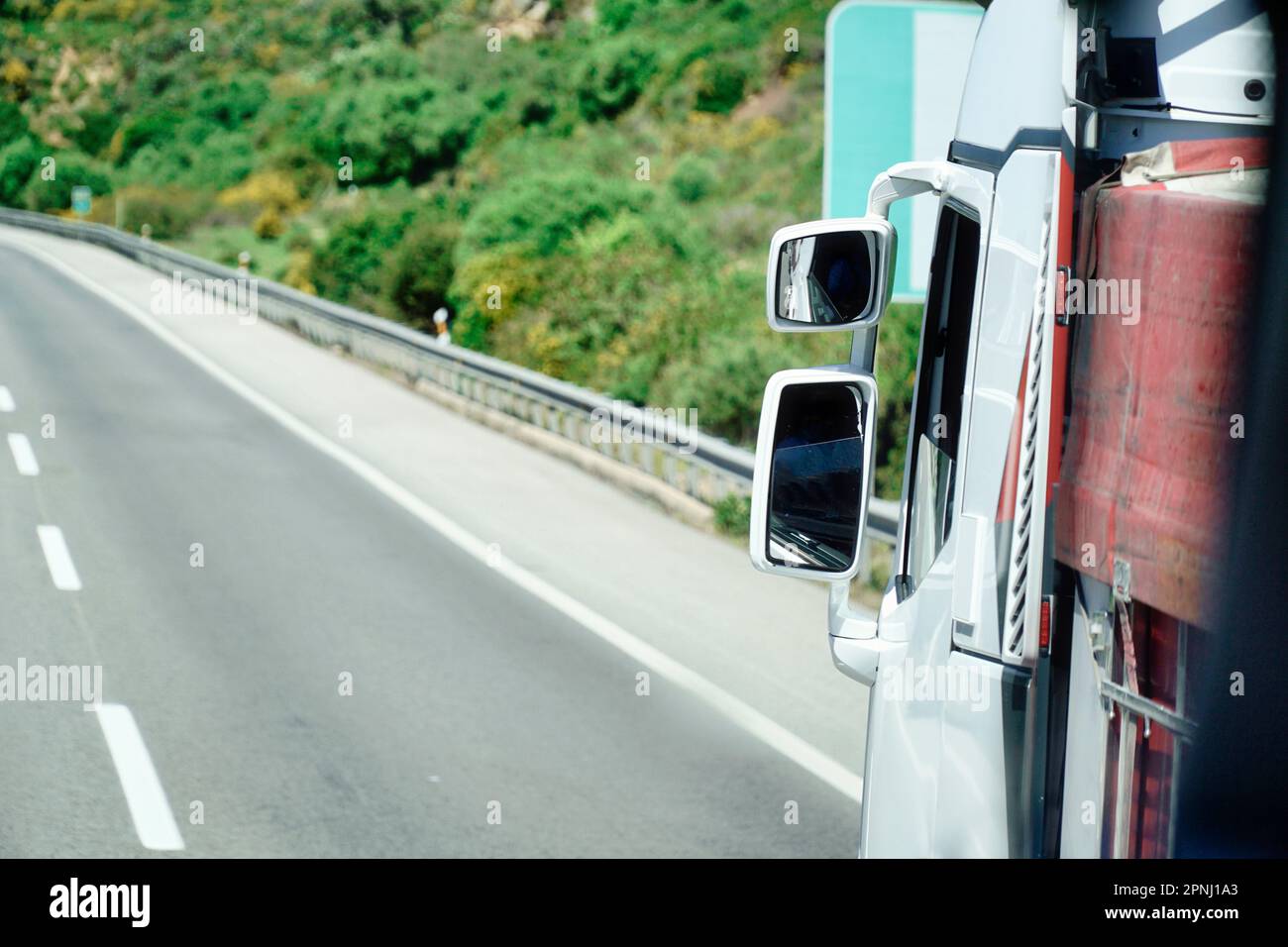 Truck on a road - close-up Stock Photo - Alamy