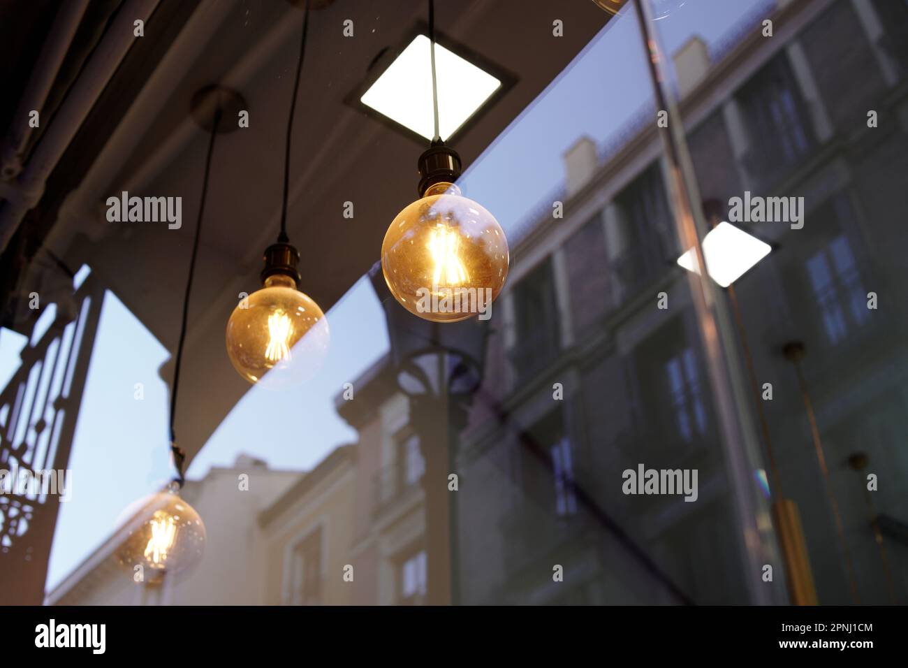 Metal hanging chandeliers hi-res stock photography and images - Alamy
