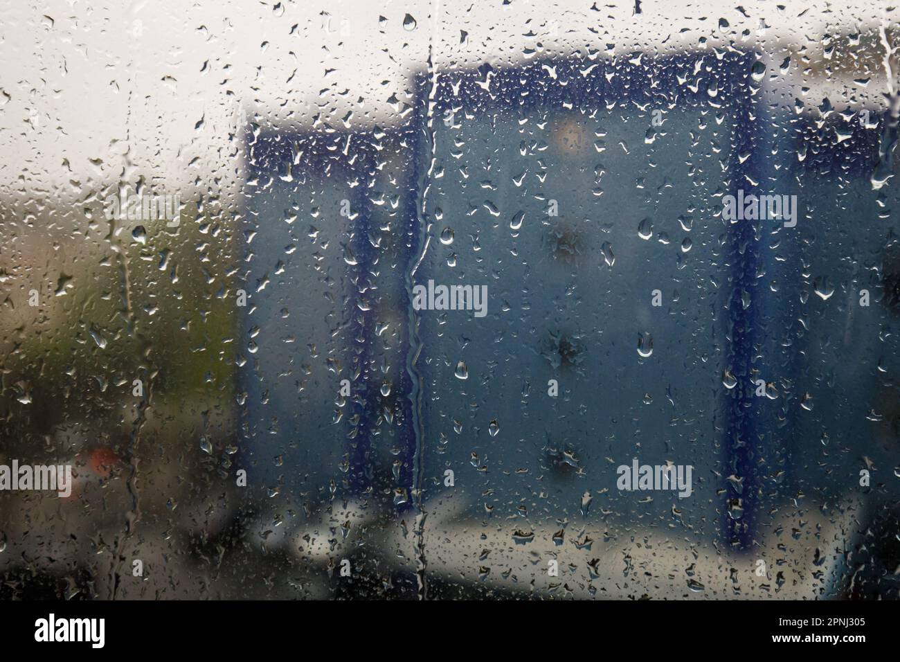 The glass of a window with natural raindrops (water drops Stock Photo ...