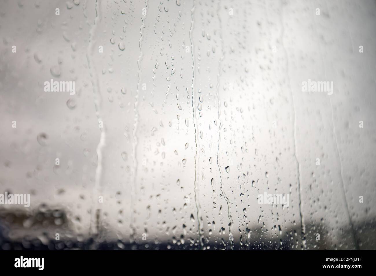 The glass of a window with natural raindrops (water drops Stock Photo ...