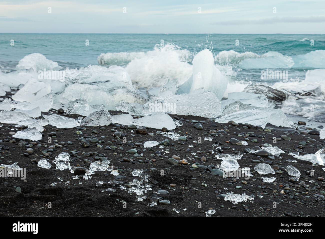 Spectacular view of the Diamond Beach in Jokulsarlon Bay, Iceland, with ...