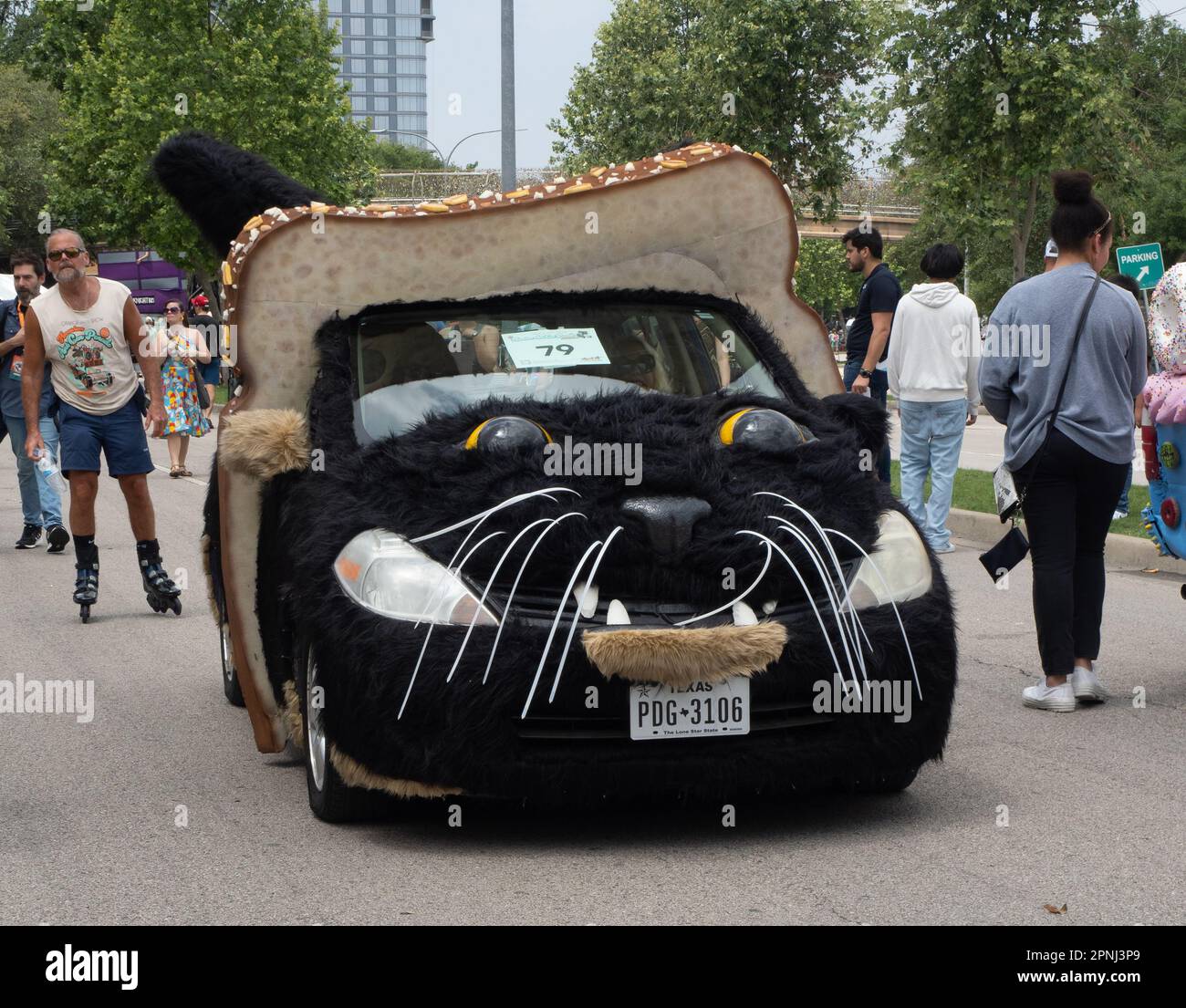 2023 Houston Art Car decorated as a black furry mouse that's eaten ...