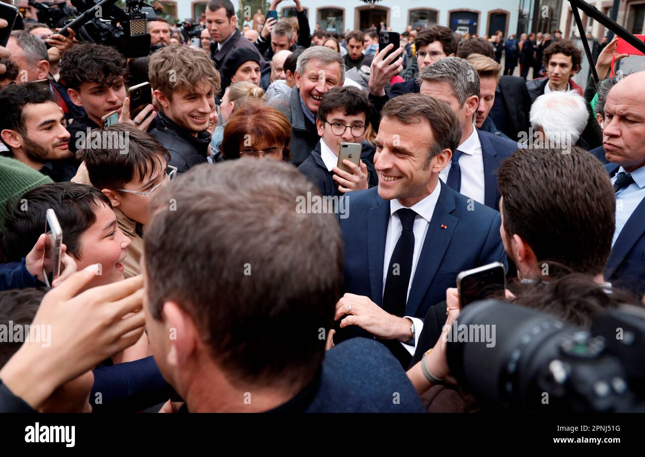 French President Emmanuel Macron meets residents after visiting a ...