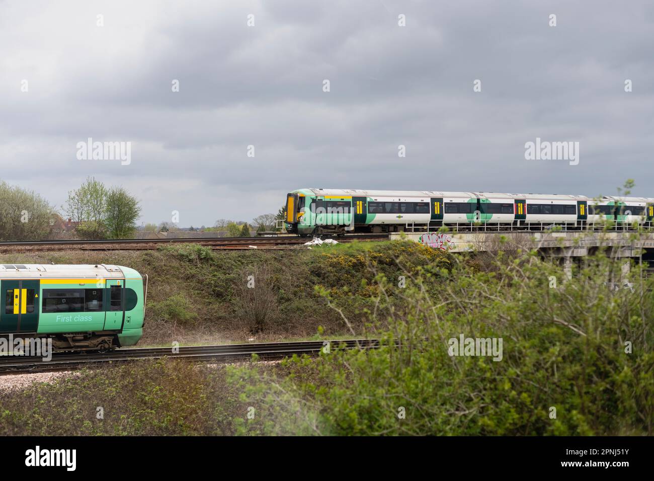 Two trains at different levels at the intersection at the edge of ...
