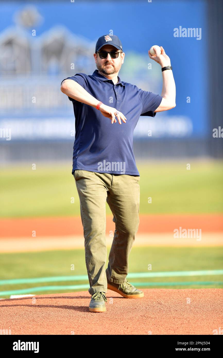 ESPN senior writer Ryan McGee throws out the first pitch before a game ...