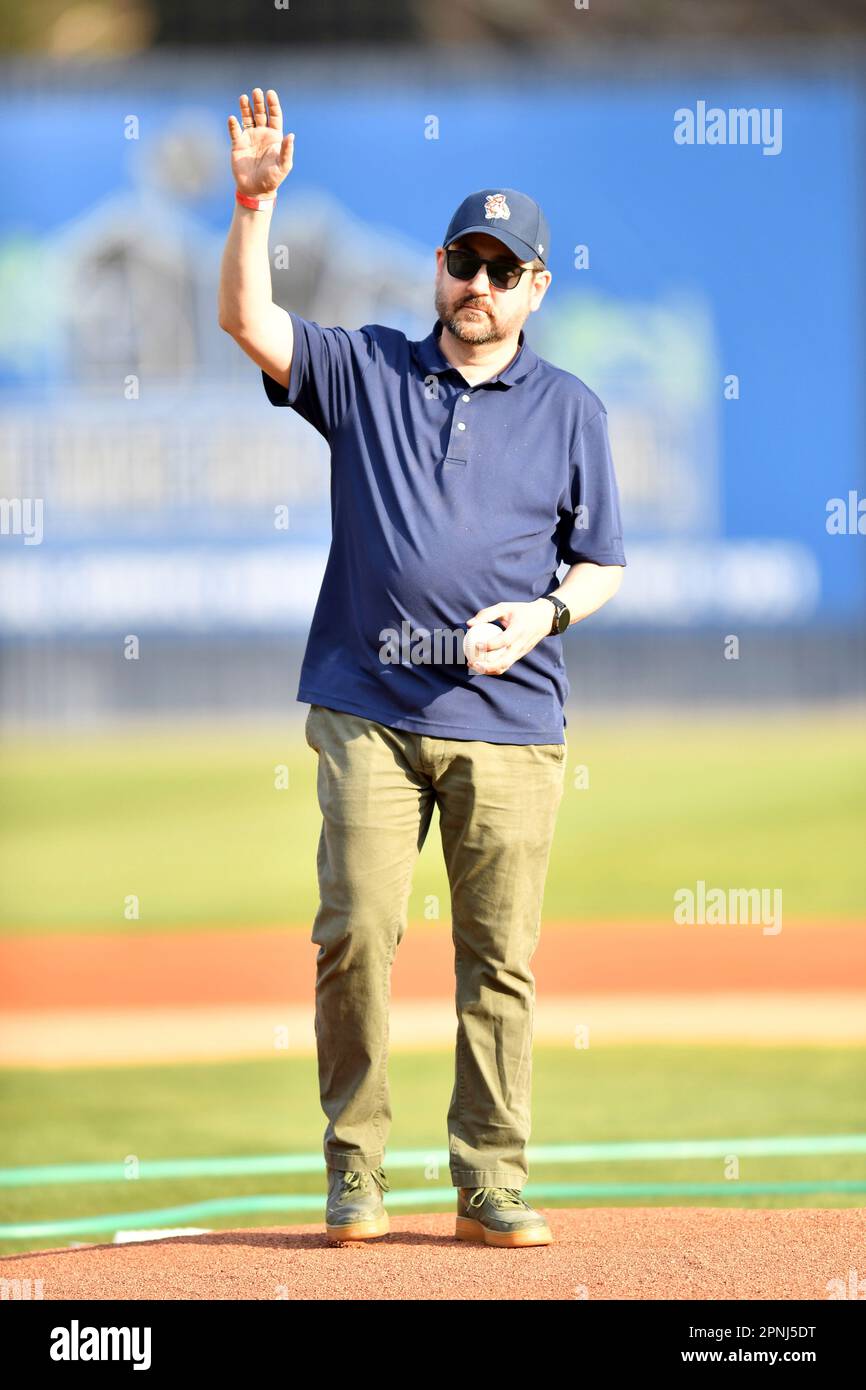 ESPN senior writer Ryan McGee waves to the crowd before throwing out ...