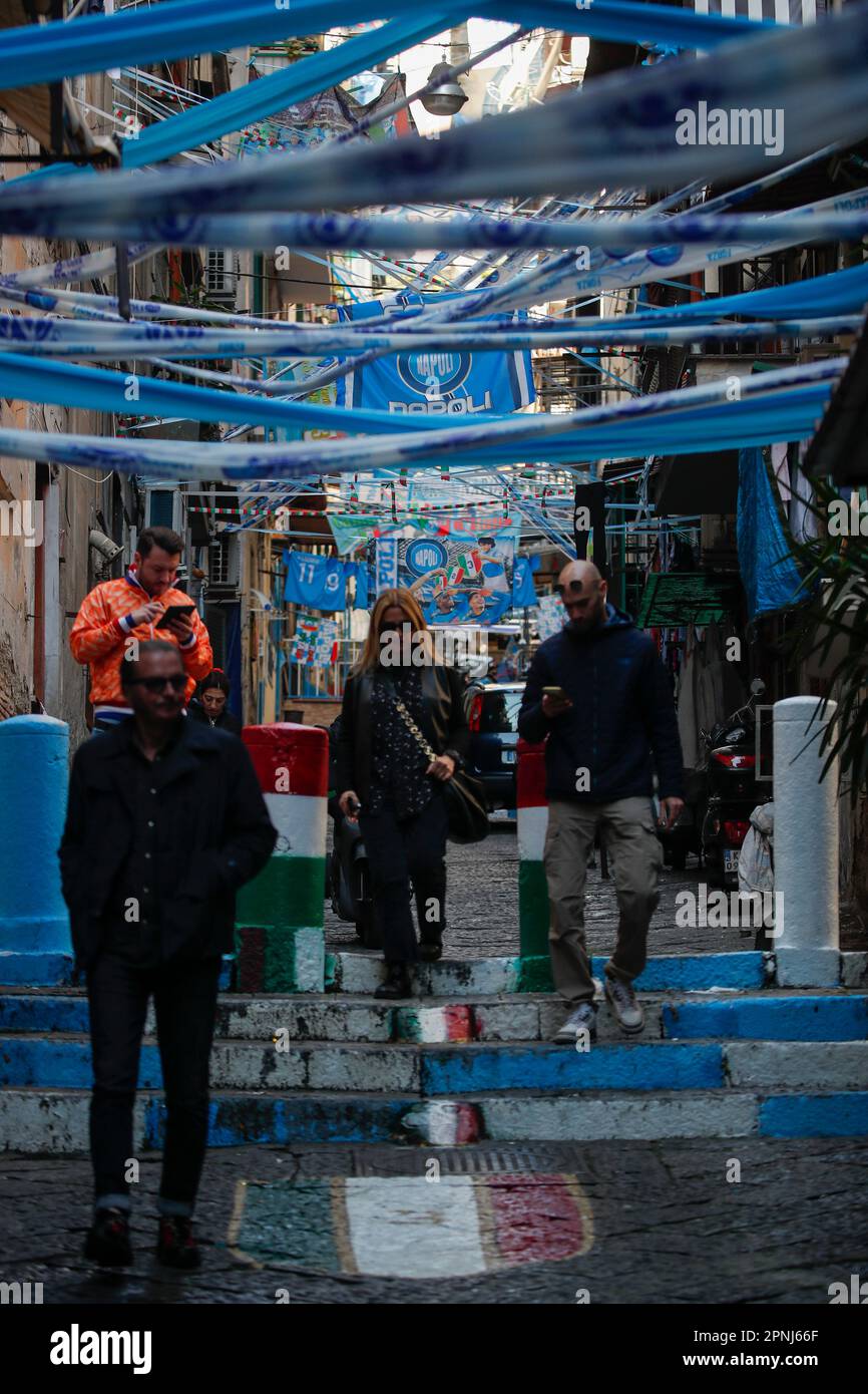Naples, Italy. 19th Apr, 2023. People walks under ribbons with the ...
