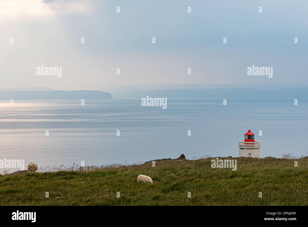Sunset view of a beautiful lighthouse in the icelandic countryside in ...