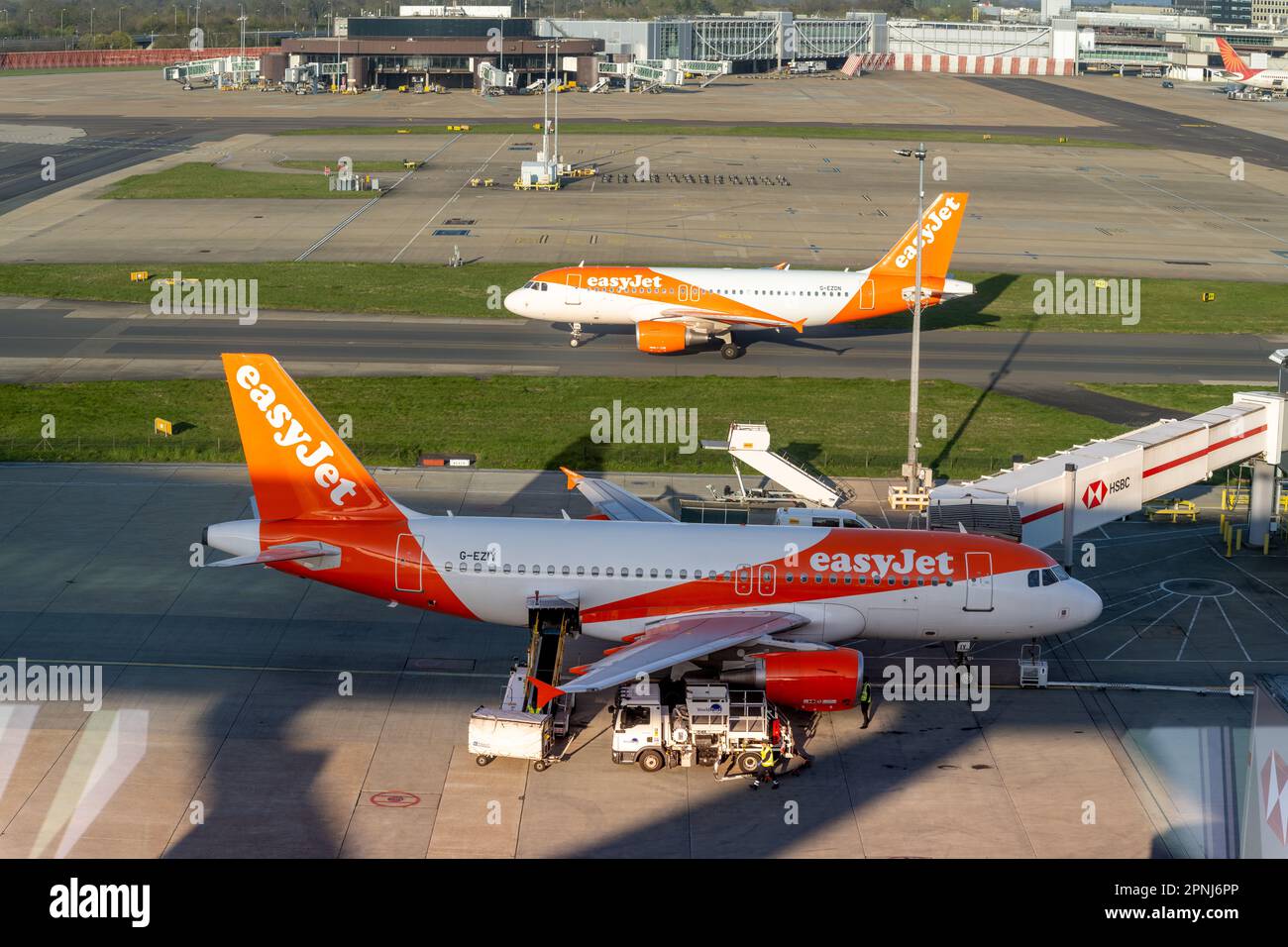 Aerial view of a Plane being refueled and luggage loaded at airport ...