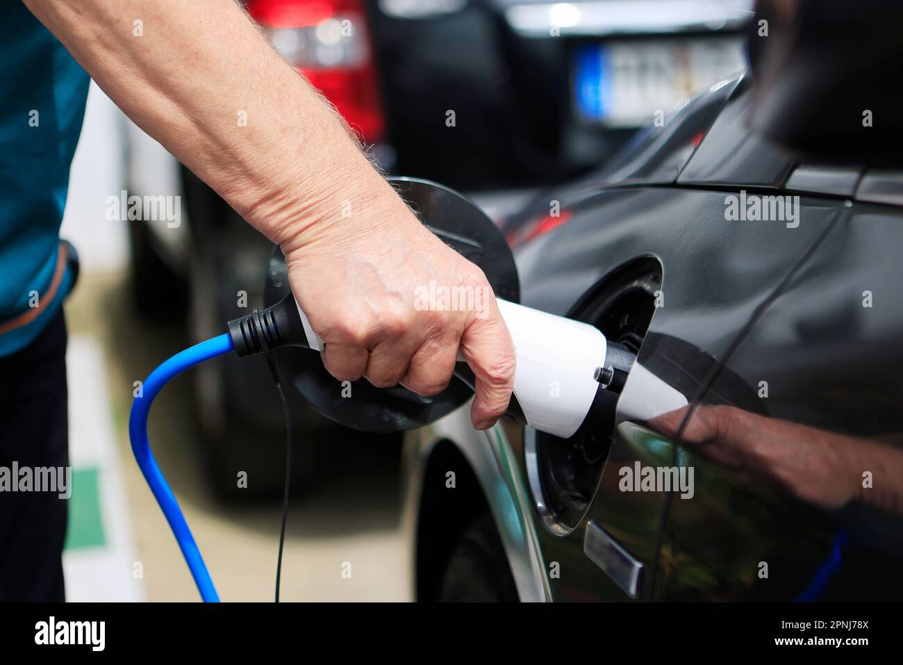 E-Mobility, Charging an electric car Stock Photo - Alamy