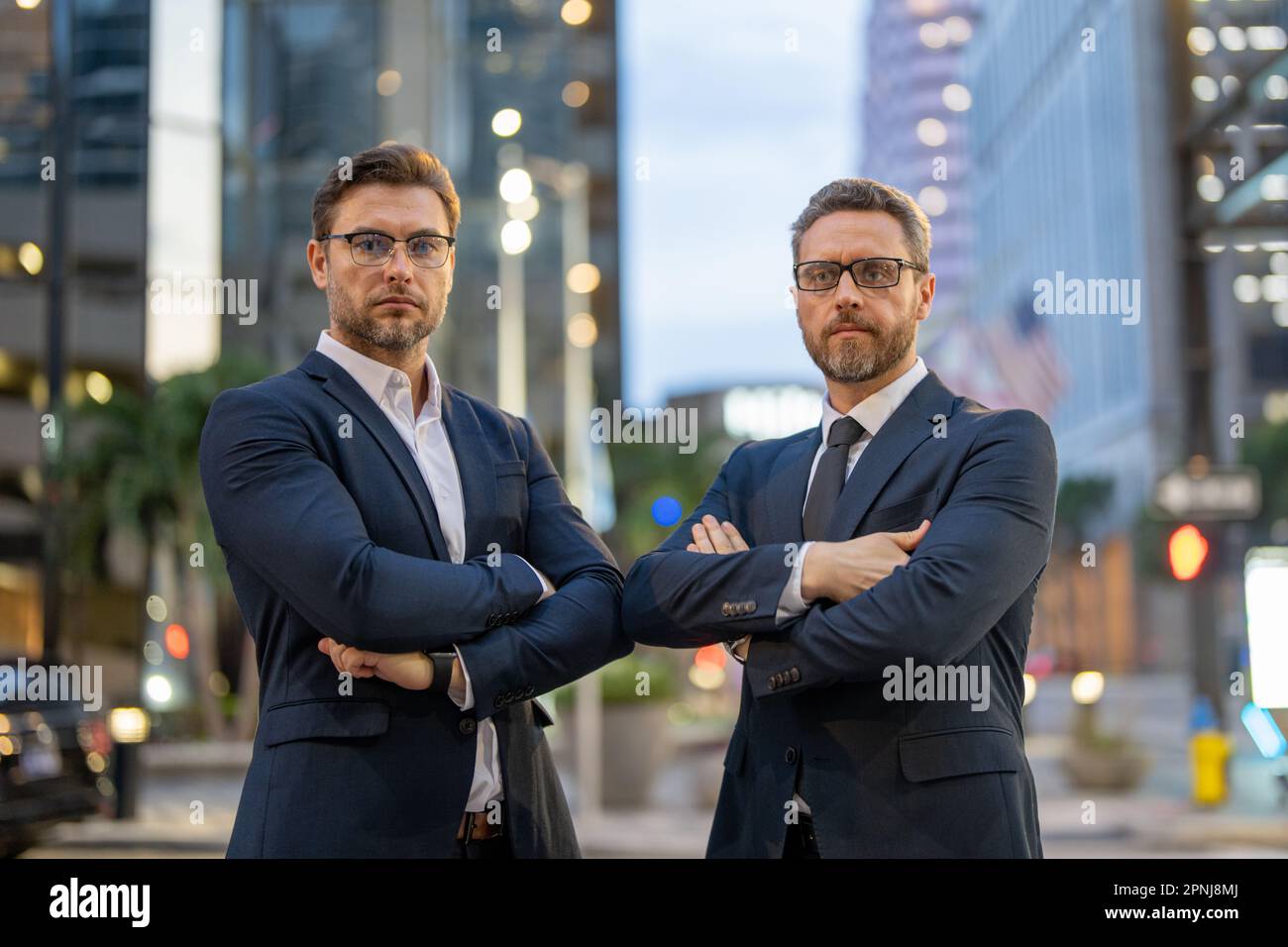 The two business team worked together to achieve their goals. Business ...