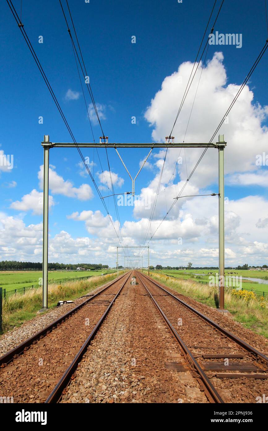Railroad track through the low land of the Zuidplaspolder in the ...