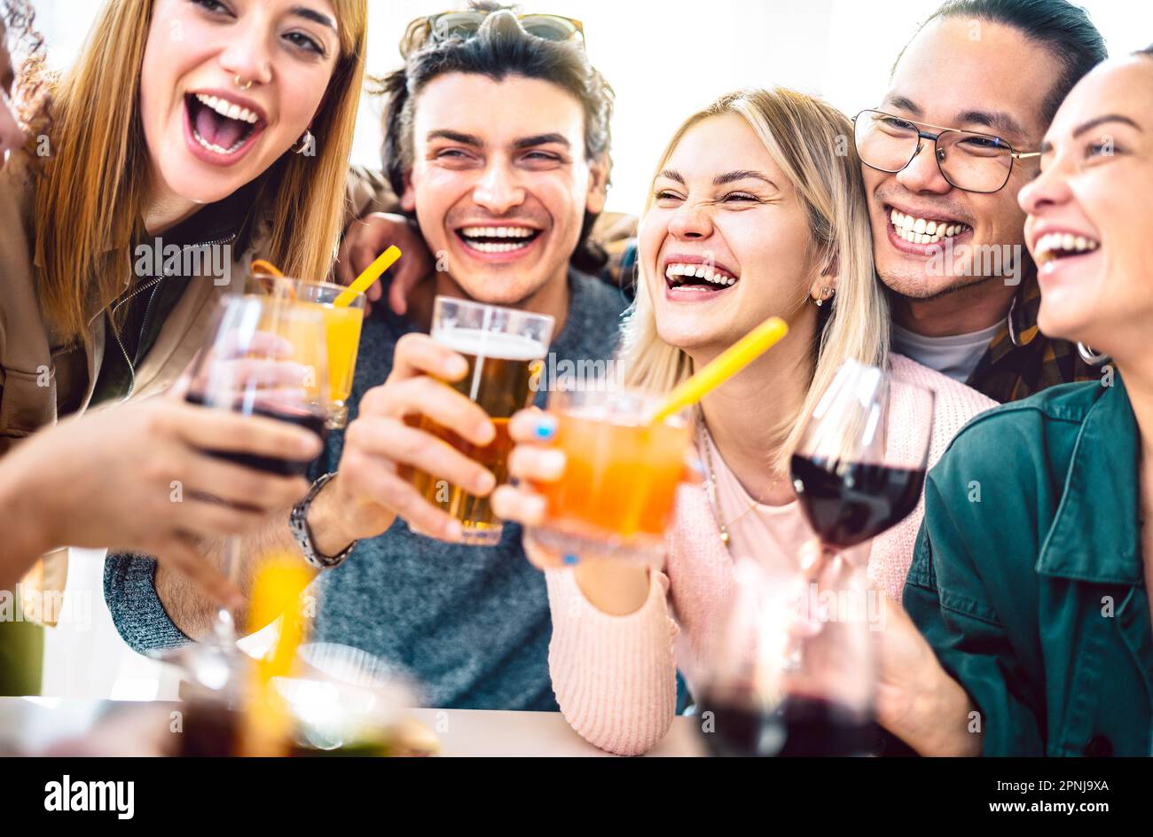 Diverse Friends Toasting Fancy Mixed Cocktails Young People Having