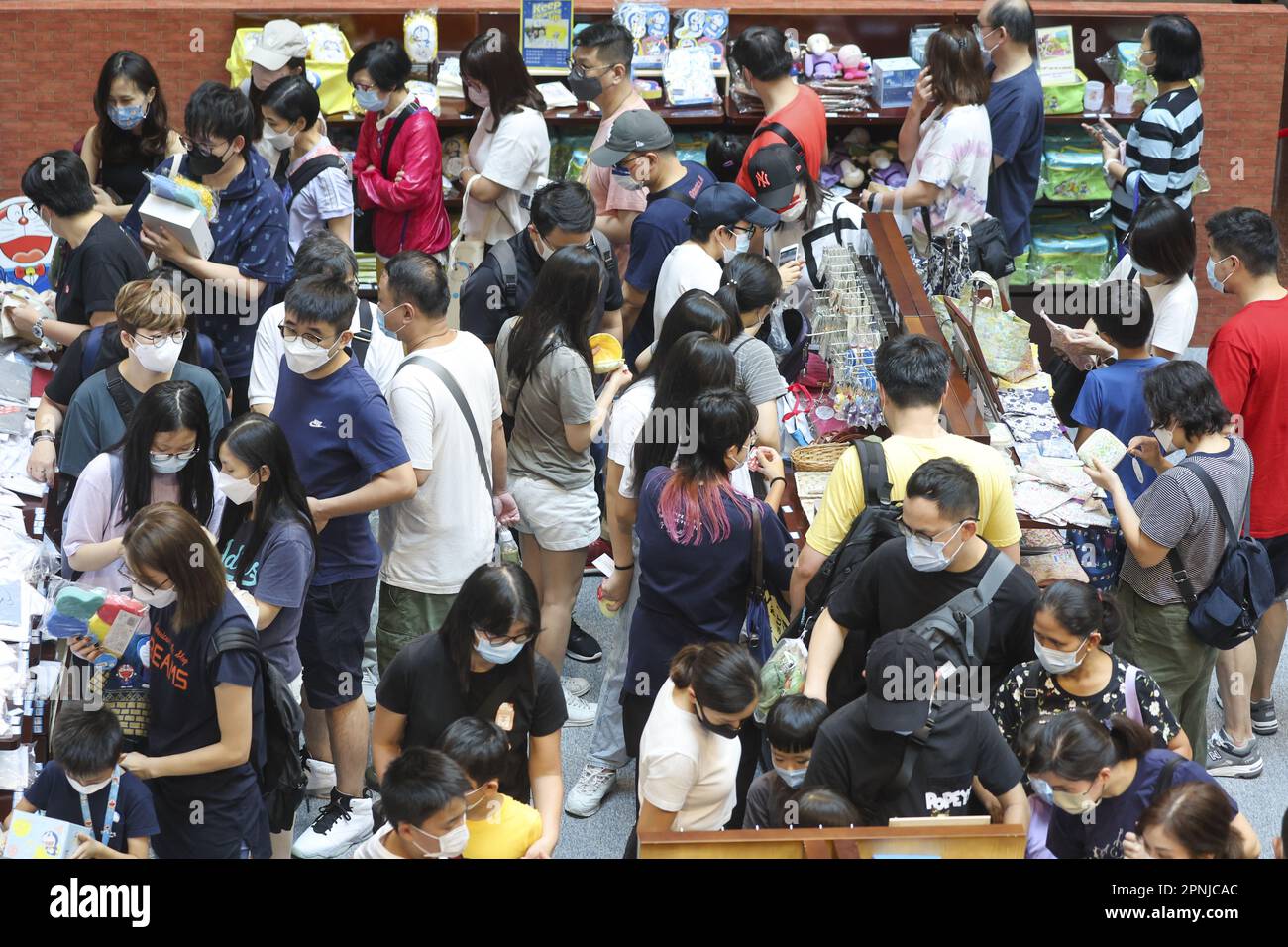 Shopper shopping at the Festival Walk shopping mall in Kowloon Tong ...