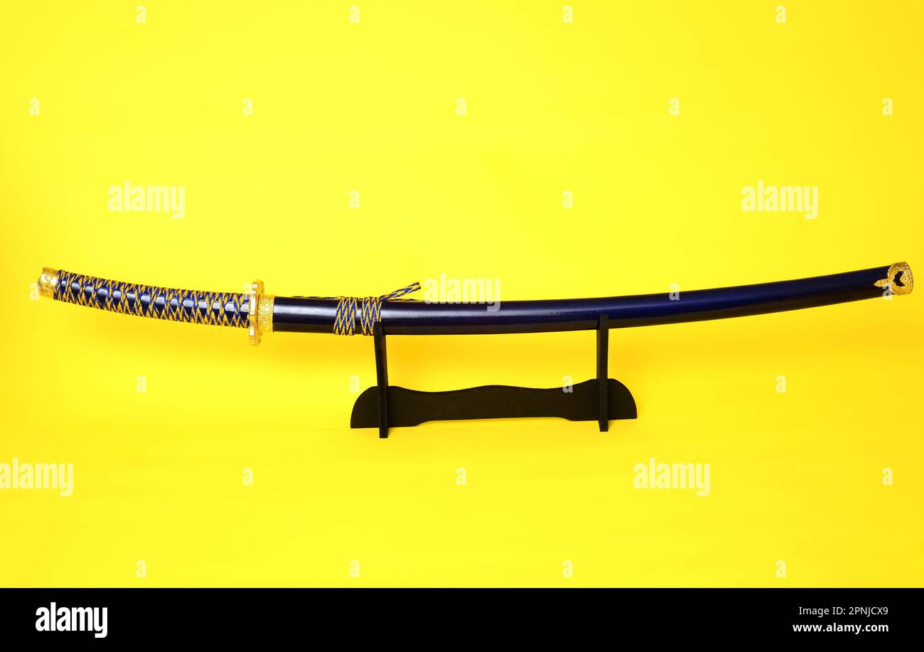 Samurai sword, Katana, Wakizashi, Tanto, isolated on yellow background ...