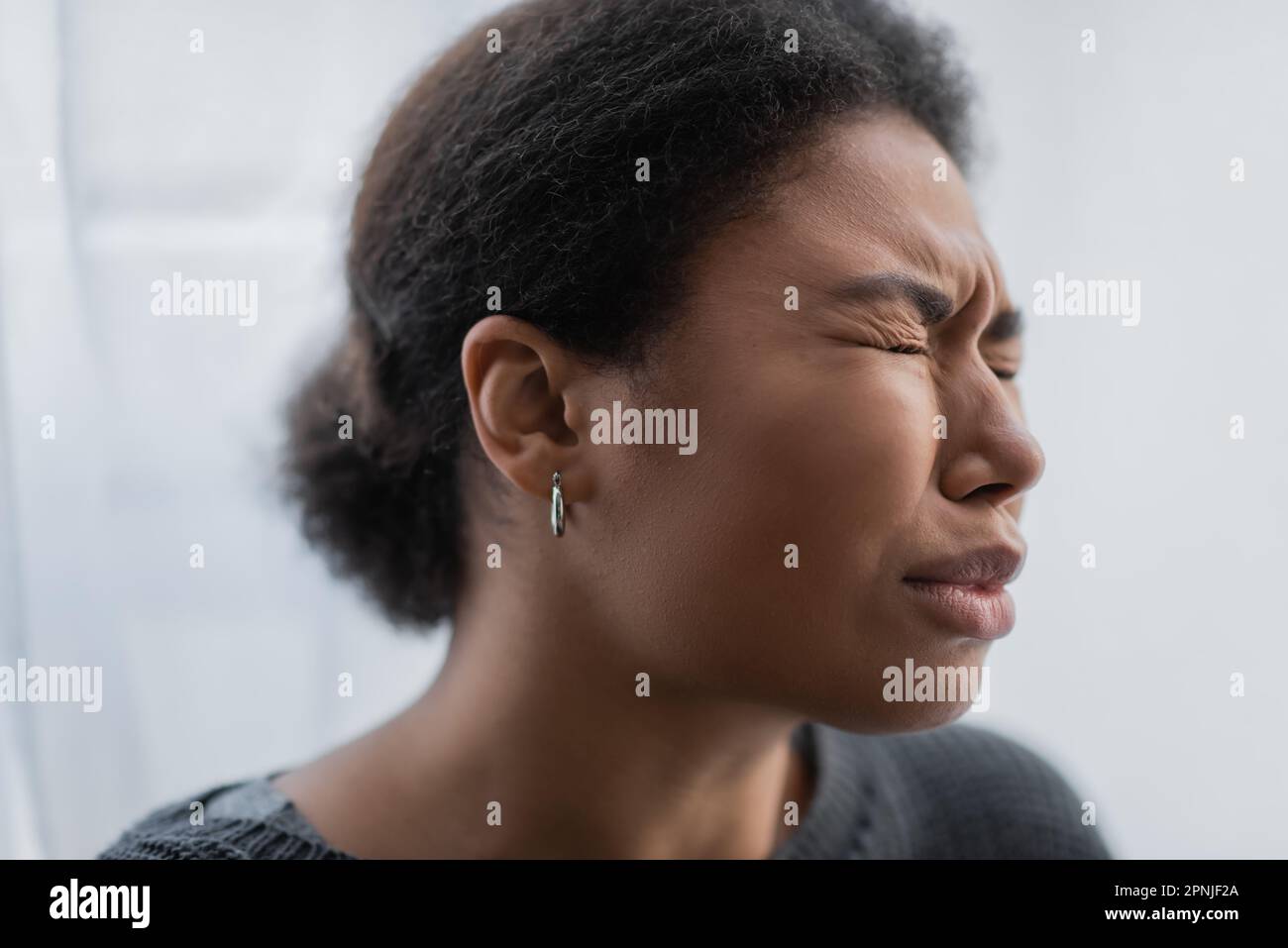 Sad multiracial woman with psychological crisis crying at home,stock ...