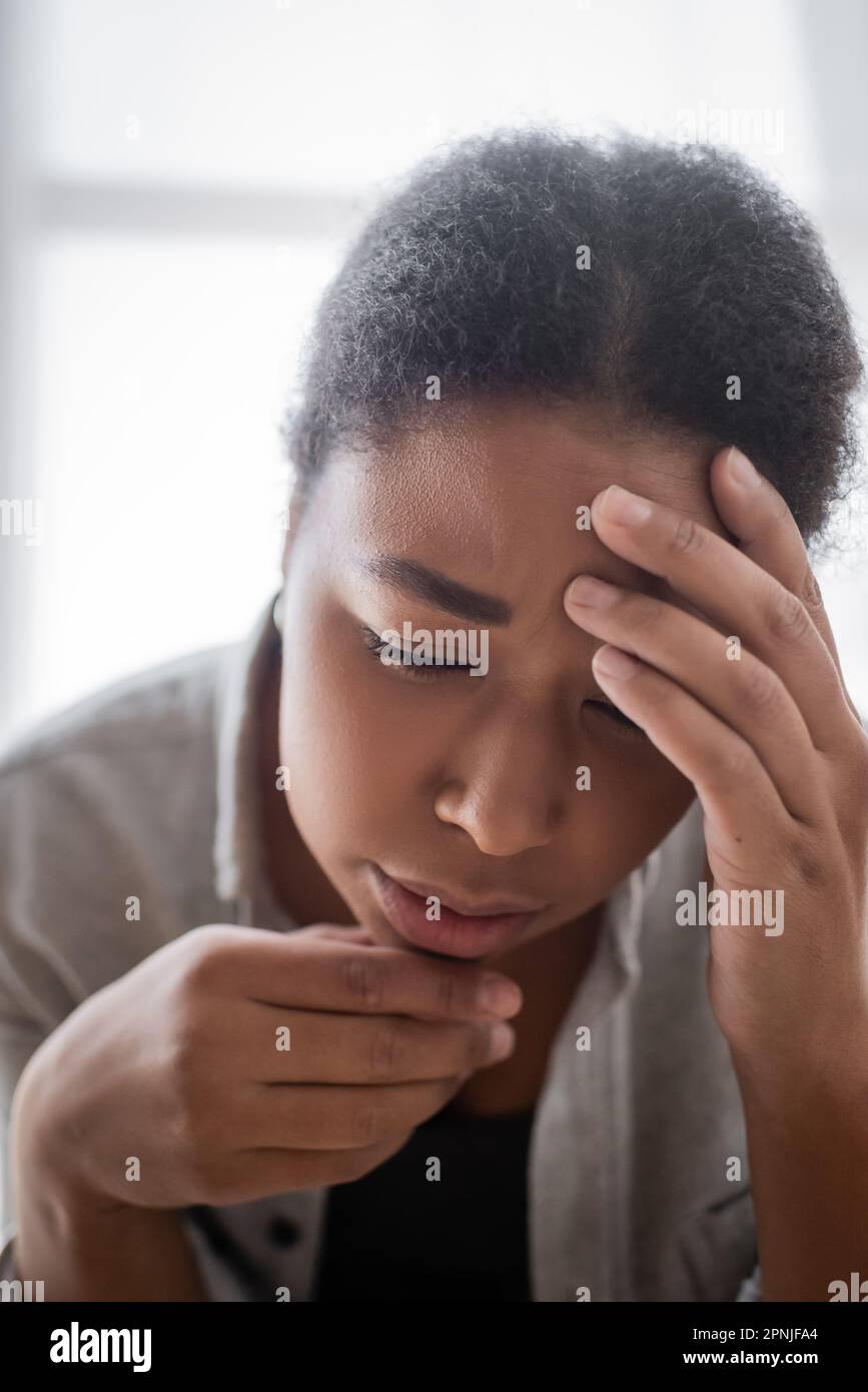 Portrait depressed multiracial woman hi-res stock photography and ...