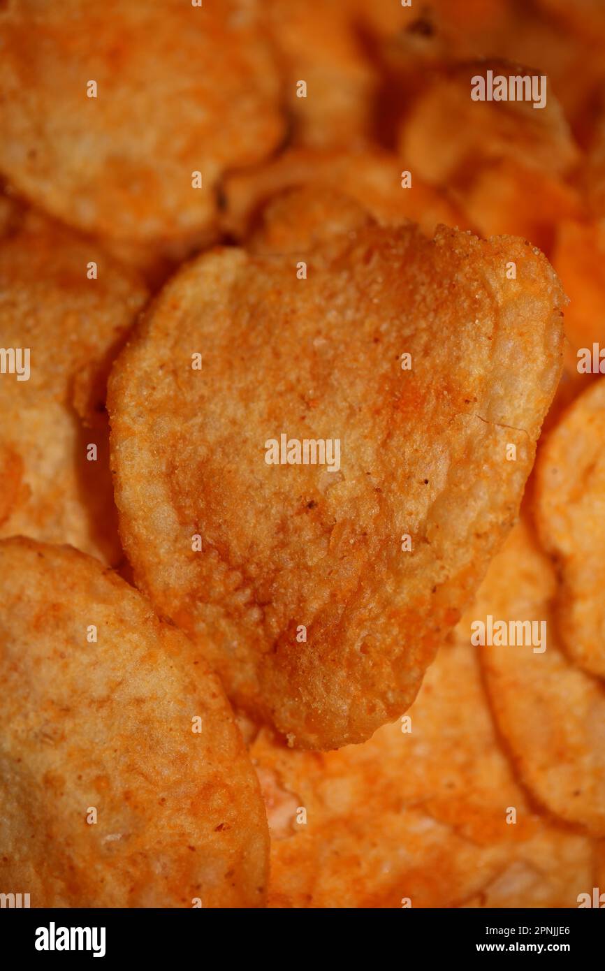 Top view of potato chips with paprika spice fast food concept eating ...