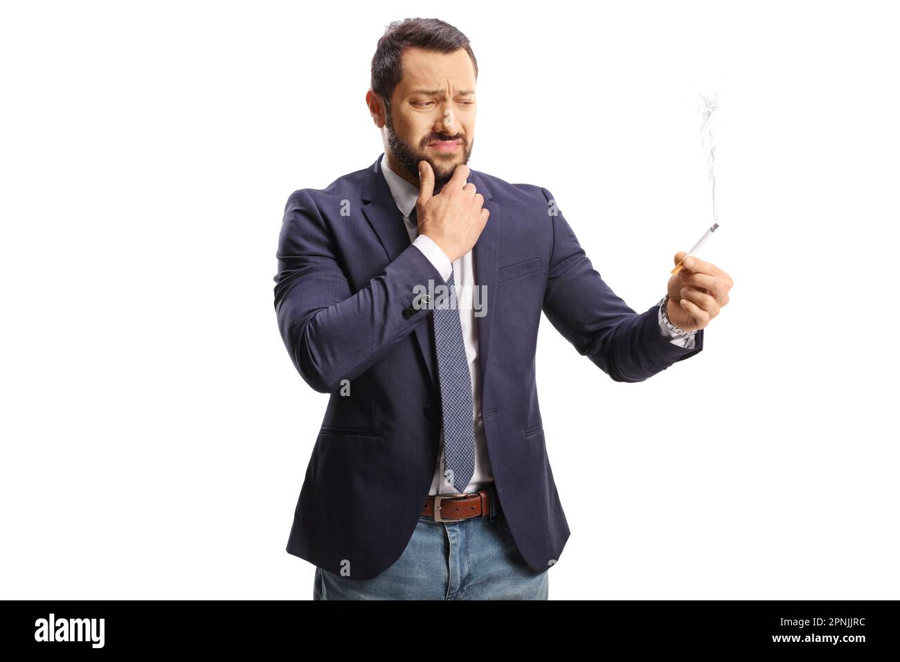 Doubtful man holding a cigarette isolated on white background Stock ...