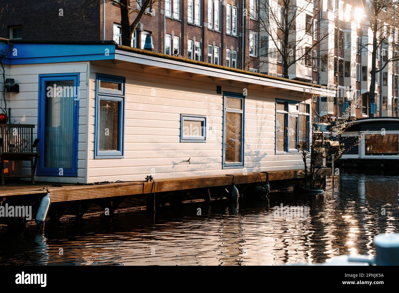 Aesthetic canals of Amsterdam at sunset, view from the water ...