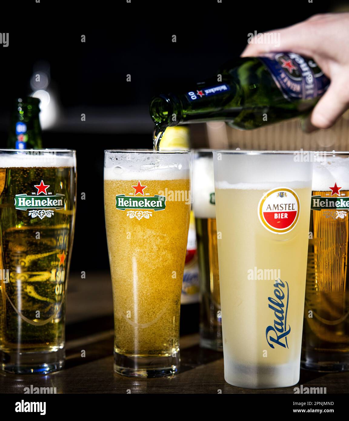 AMSTERDAM - Guests drink beer on a terrace. ANP RAMON VAN FLYMEN ...