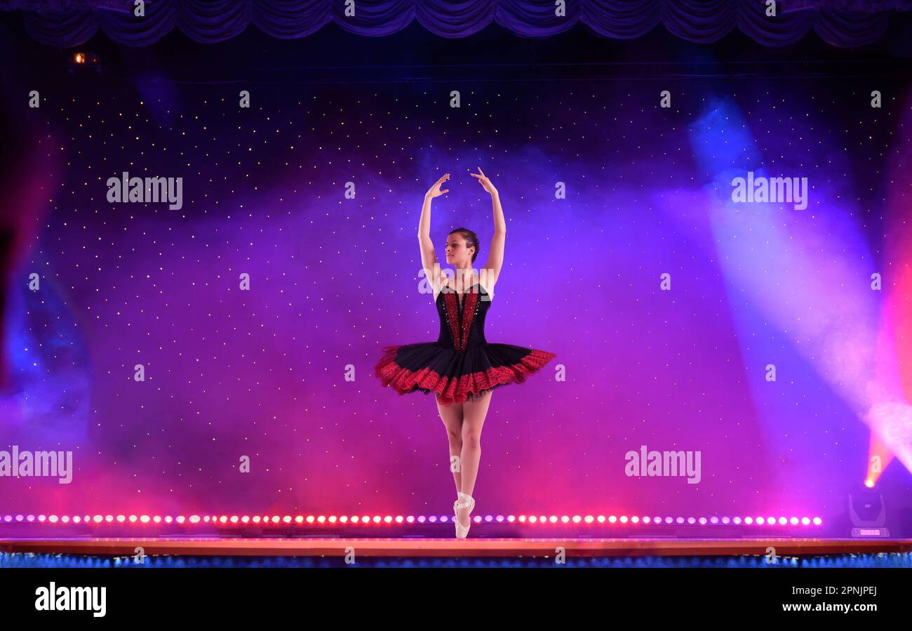 Elegant ballet dancer during a performance in a theater Stock Photo - Alamy