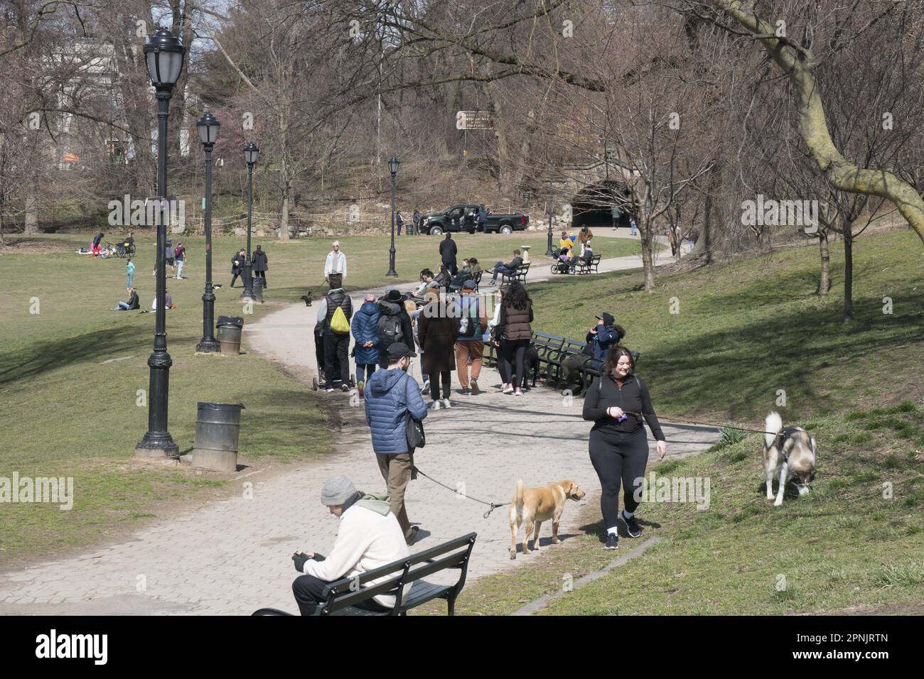 People enjoy an early spring morning on the Park Slope side of Prospect ...