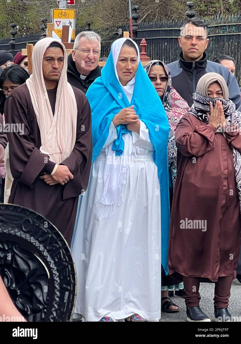 Parishoners of various churches walk the stations of the Cross together ...