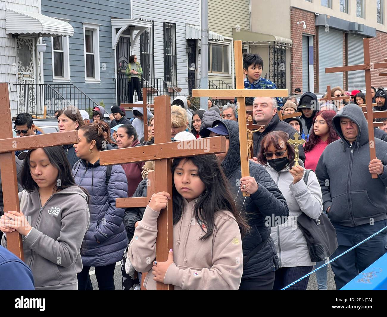 Parishoners of various churches walk the stations of the Cross together ...