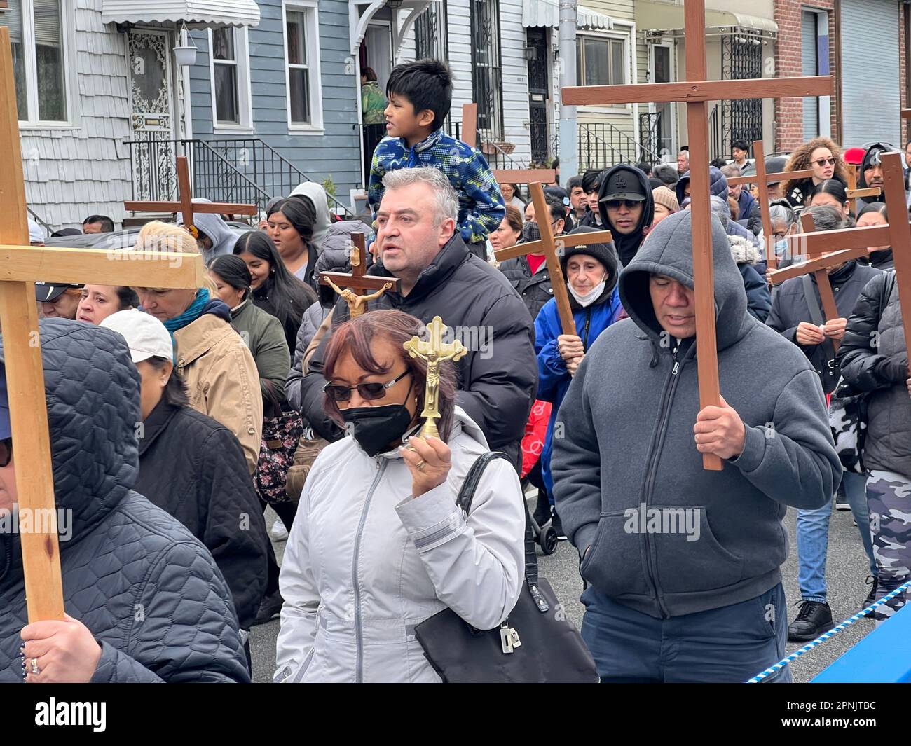 Parishoners of various churches walk the stations of the Cross together ...