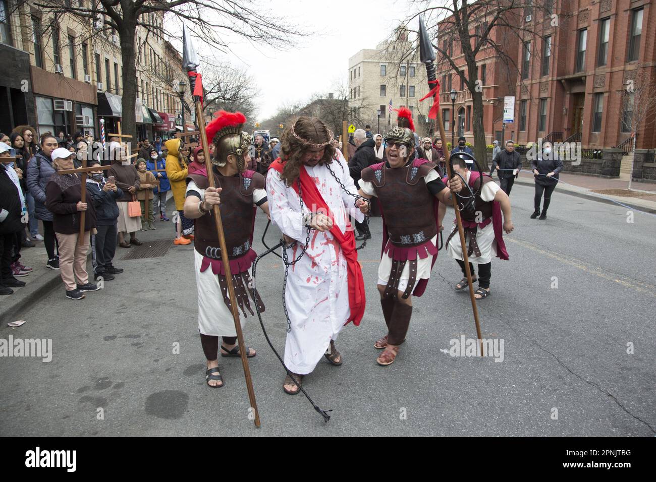 Parishoners of various churches walk the stations of the Cross together ...