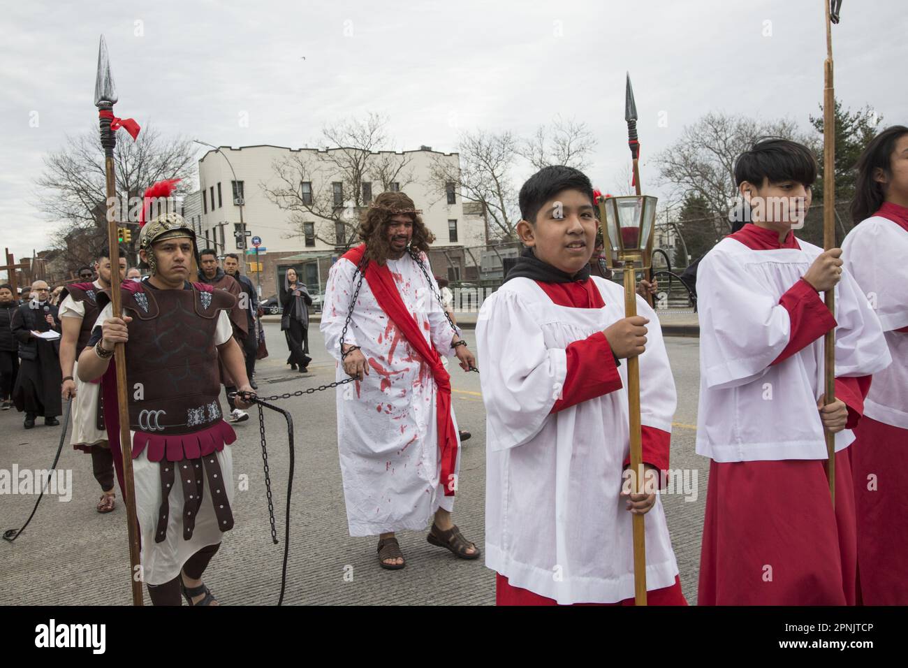 Parishoners of various churches walk the stations of the Cross together ...