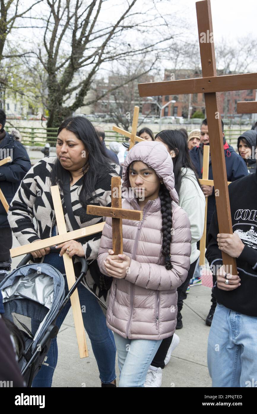 Parishoners of various churches walk the stations of the Cross together ...
