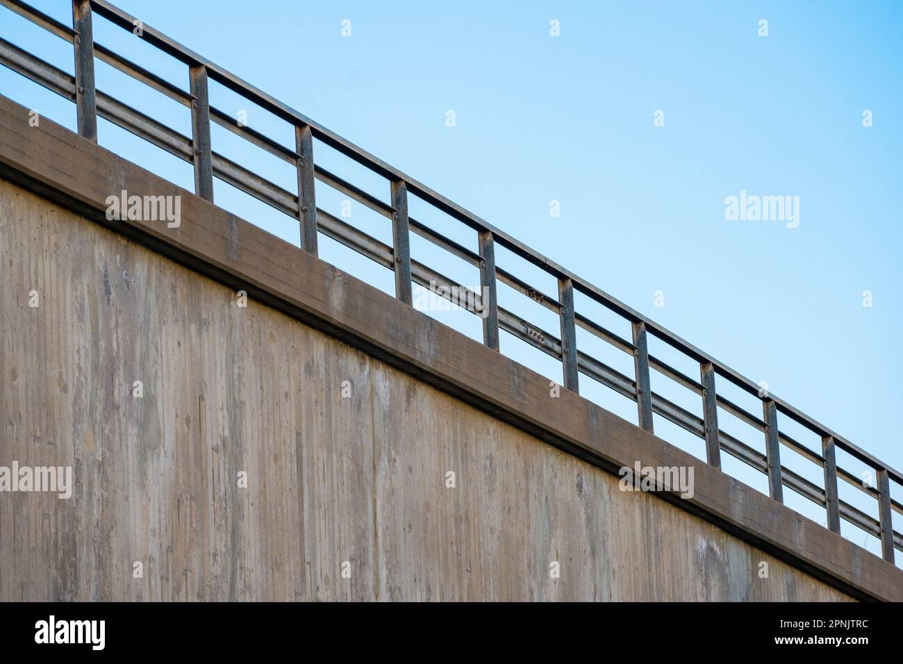 Metal rails of a concrete off ramp Stock Photo - Alamy